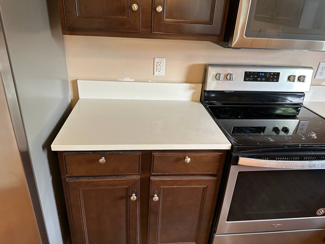 Granite Depot of Indianapolis - Frost White and Dark Cabinets - 09/04/2024